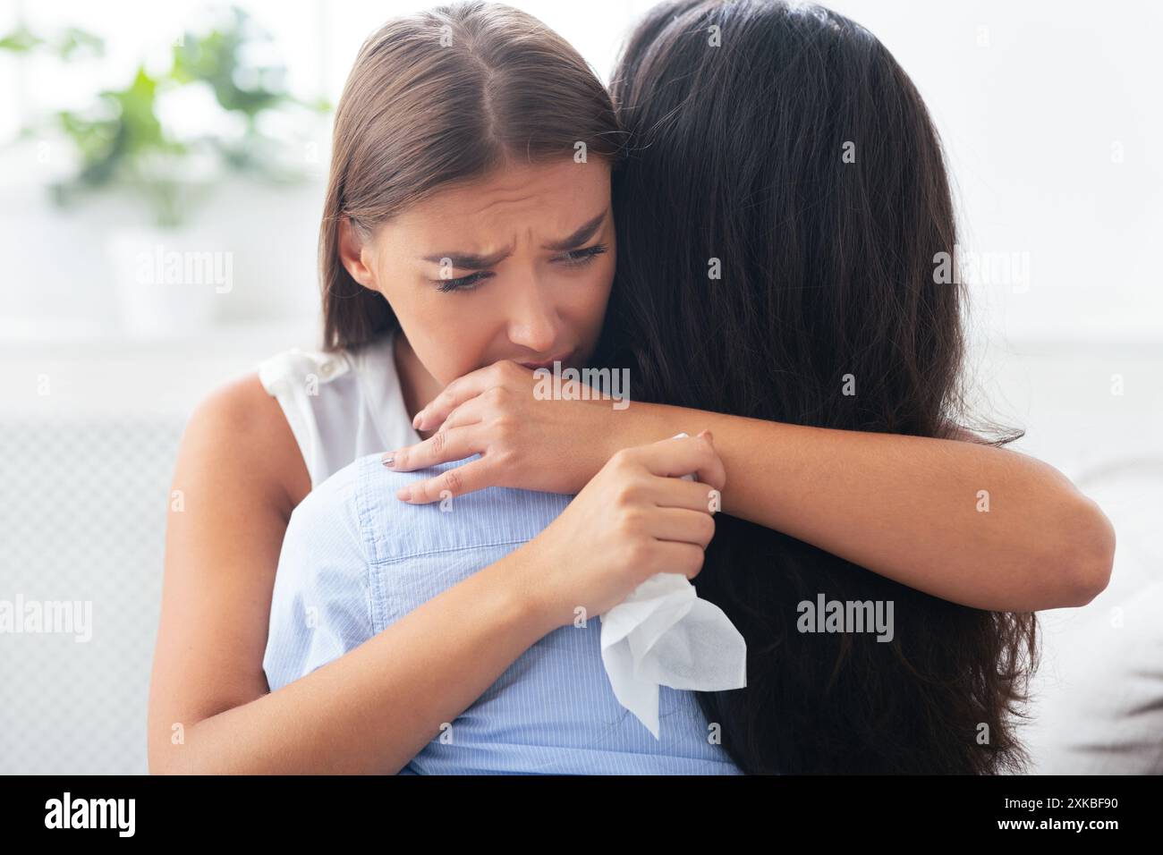 Supportive Woman Hugging Depressed Friend Comforting Her At Home Stock ...