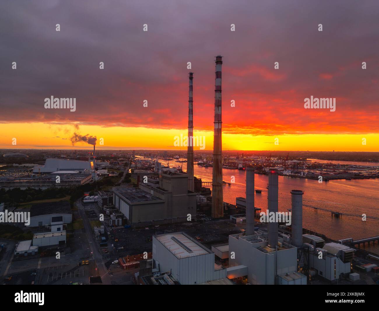 Red sunset sky at Poolbeg as a weather front clears following a ...