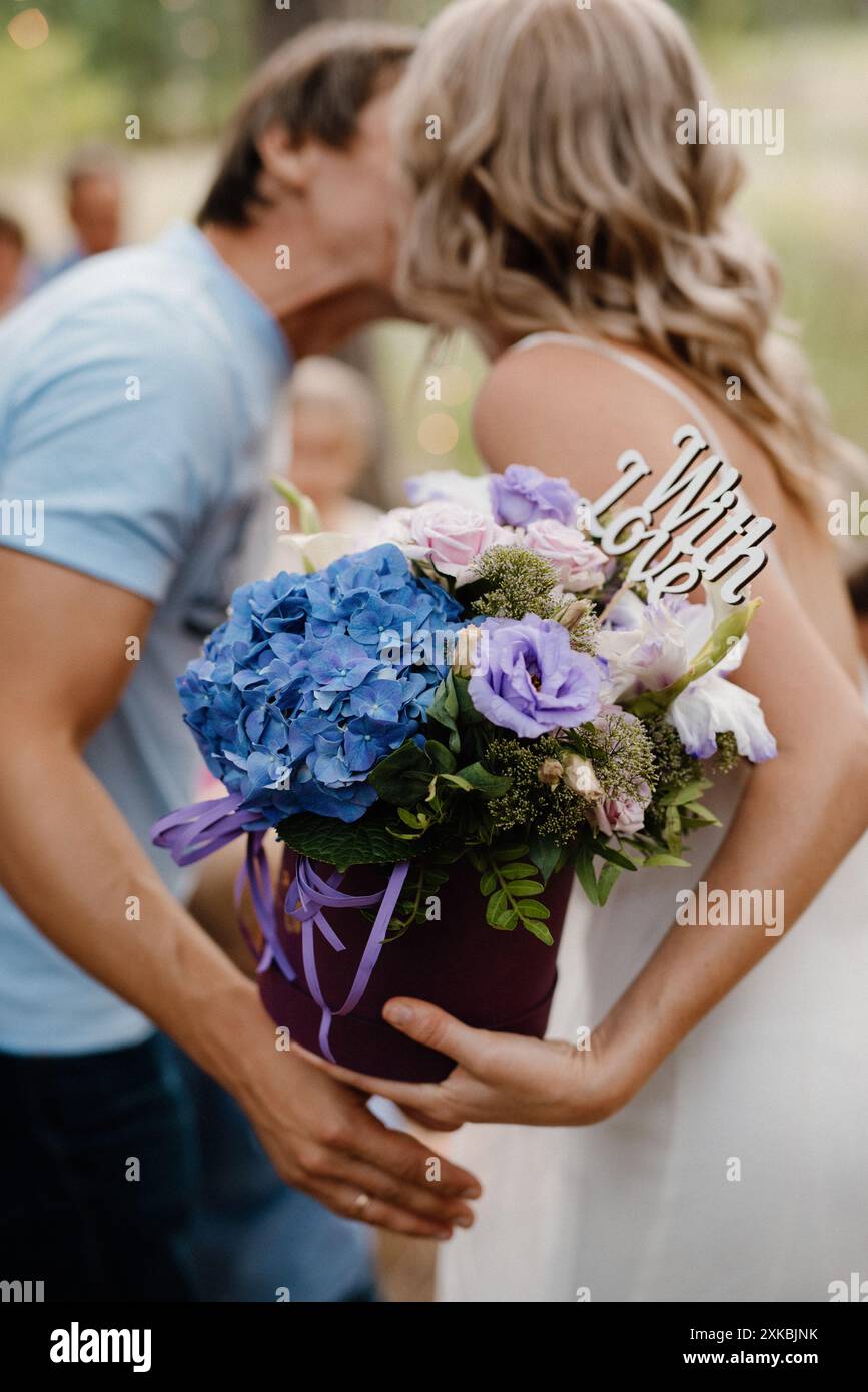 wedding congratulations of friends and guests with smiles and hugs of ...