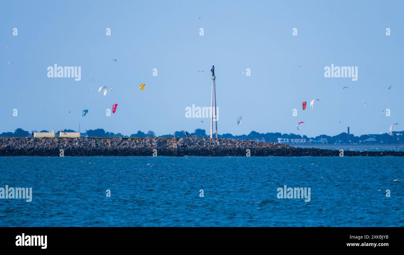 Kites at Dollymount Strand viewed from the Great South Wall Stock Photo ...