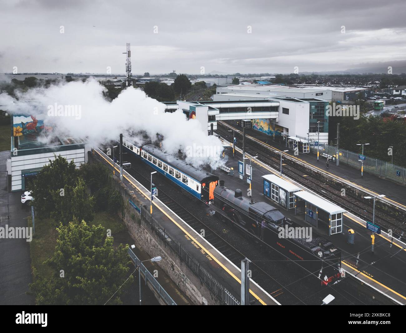 No. 131 steam train passing through Howth Junction & Donaghmede station ...