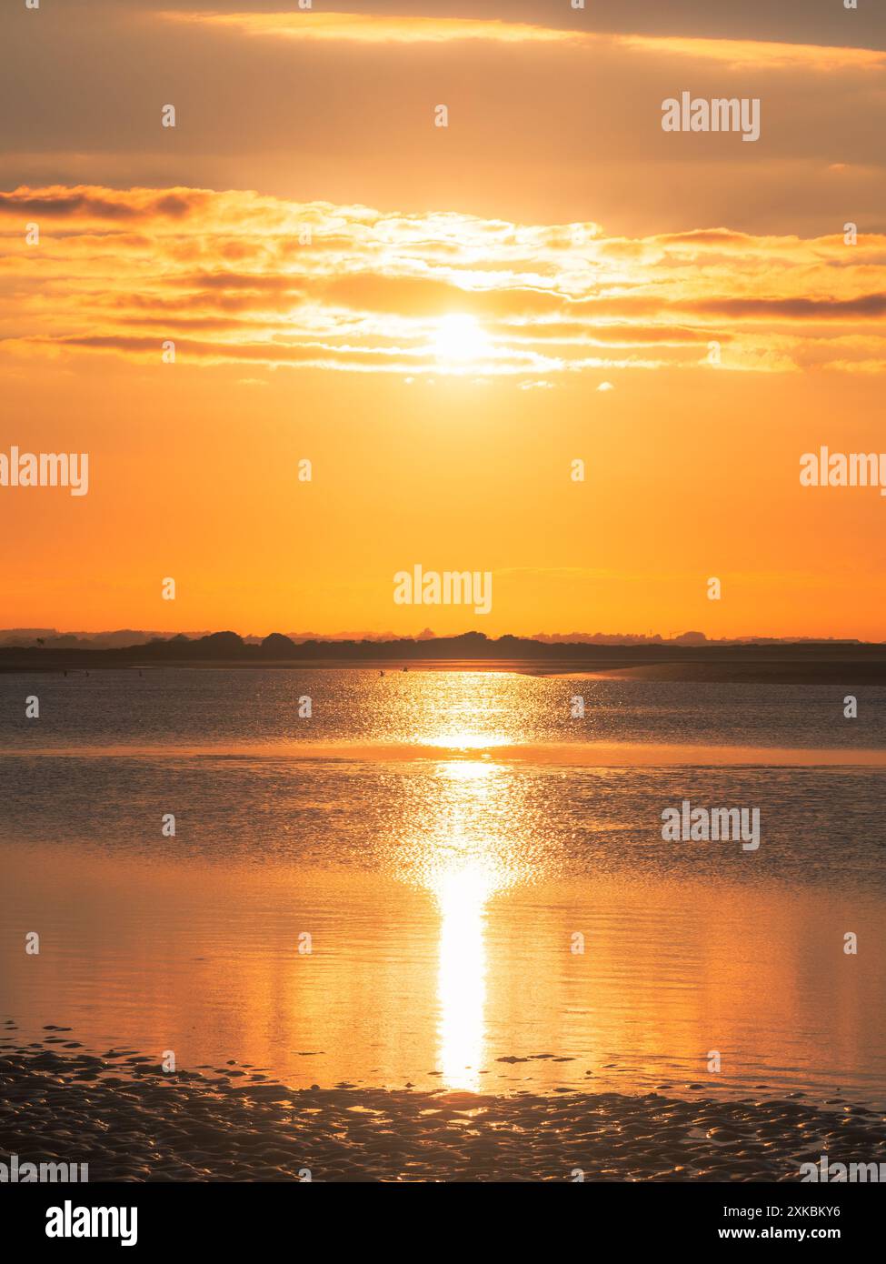 Sunset reflection at Burrow Beach Stock Photo - Alamy