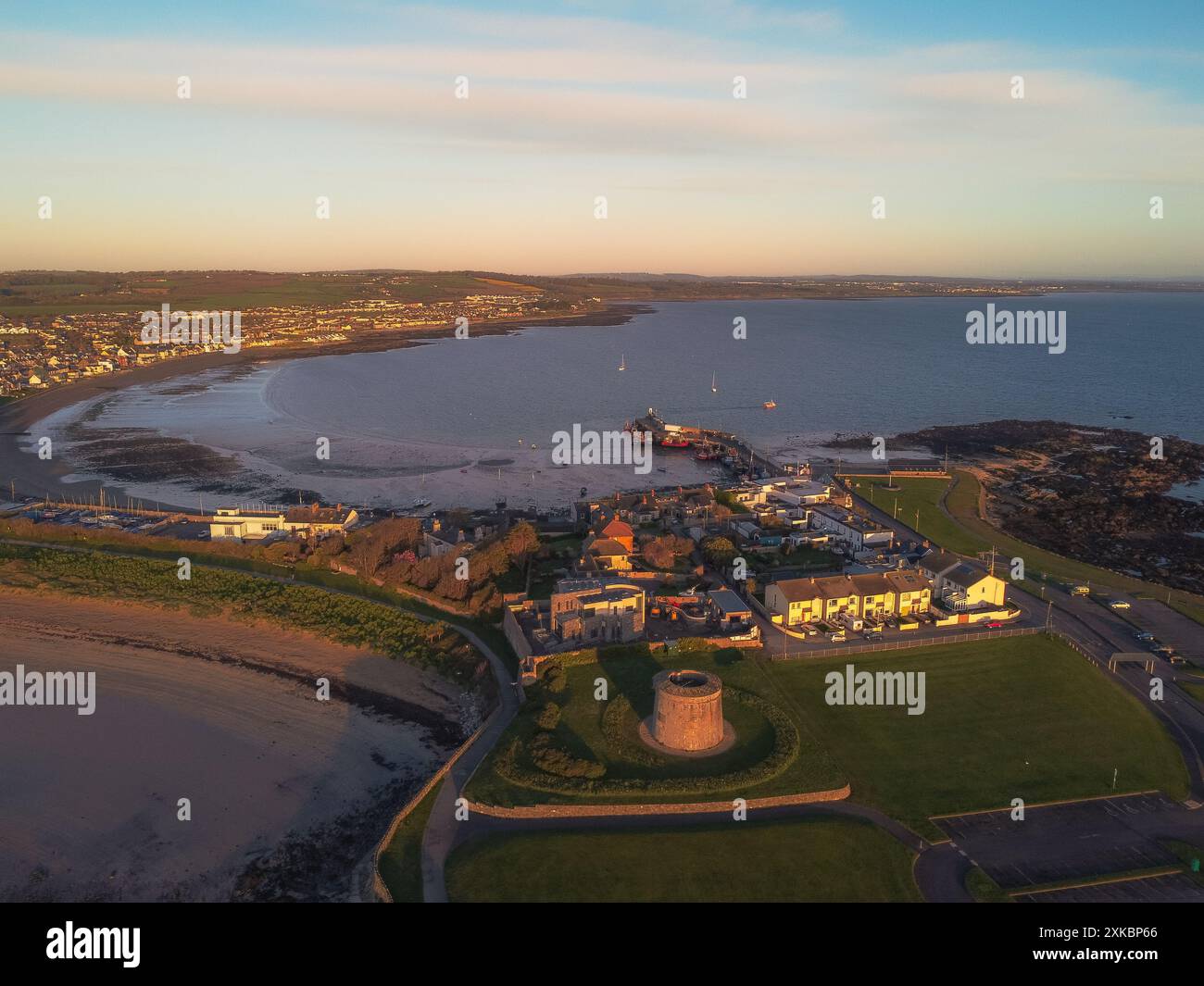 Aerial view of Red Island, Skerries South Strand and Harbour at sunrise ...