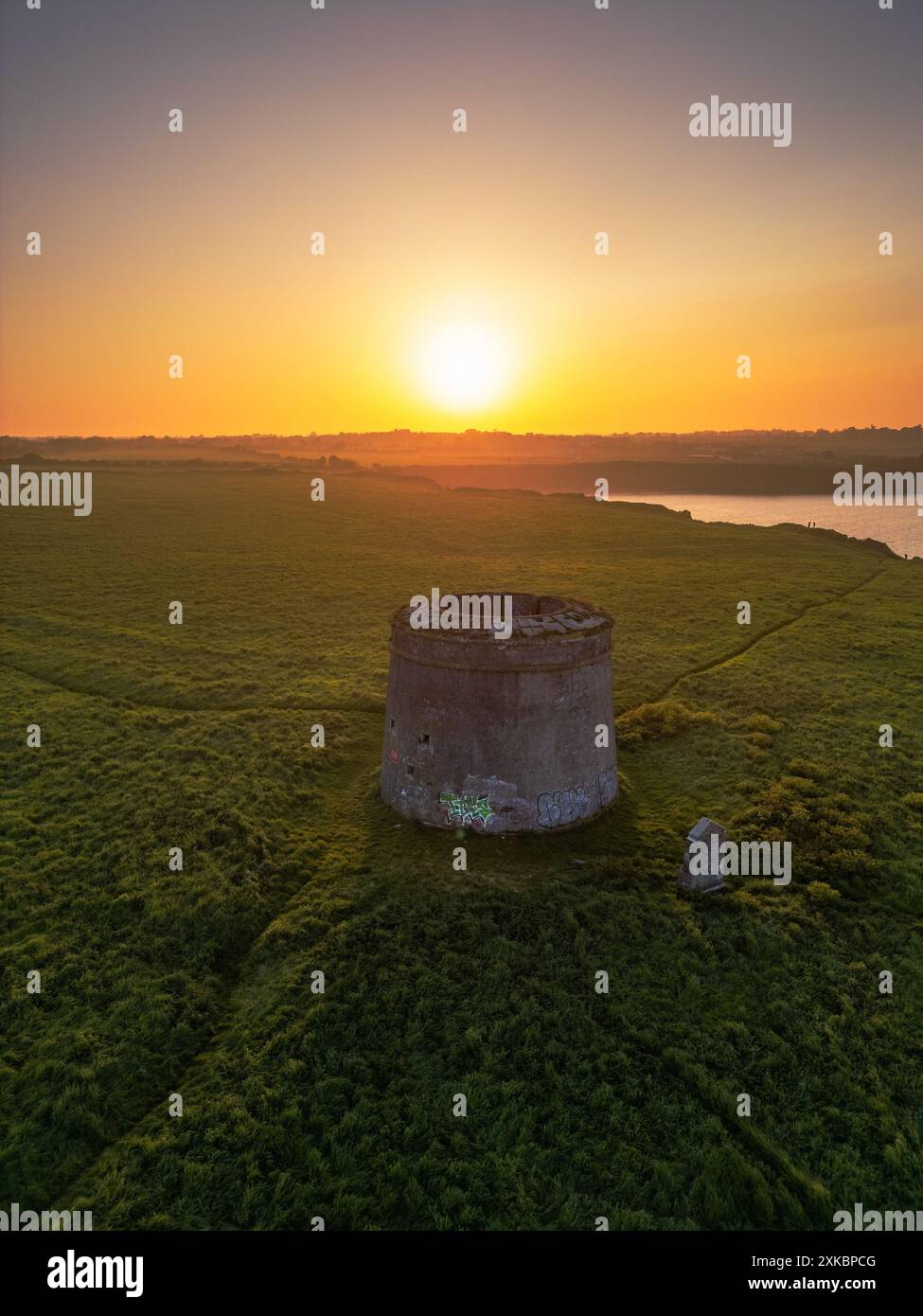 Sunset at the Drumanagh martello tower Stock Photo - Alamy