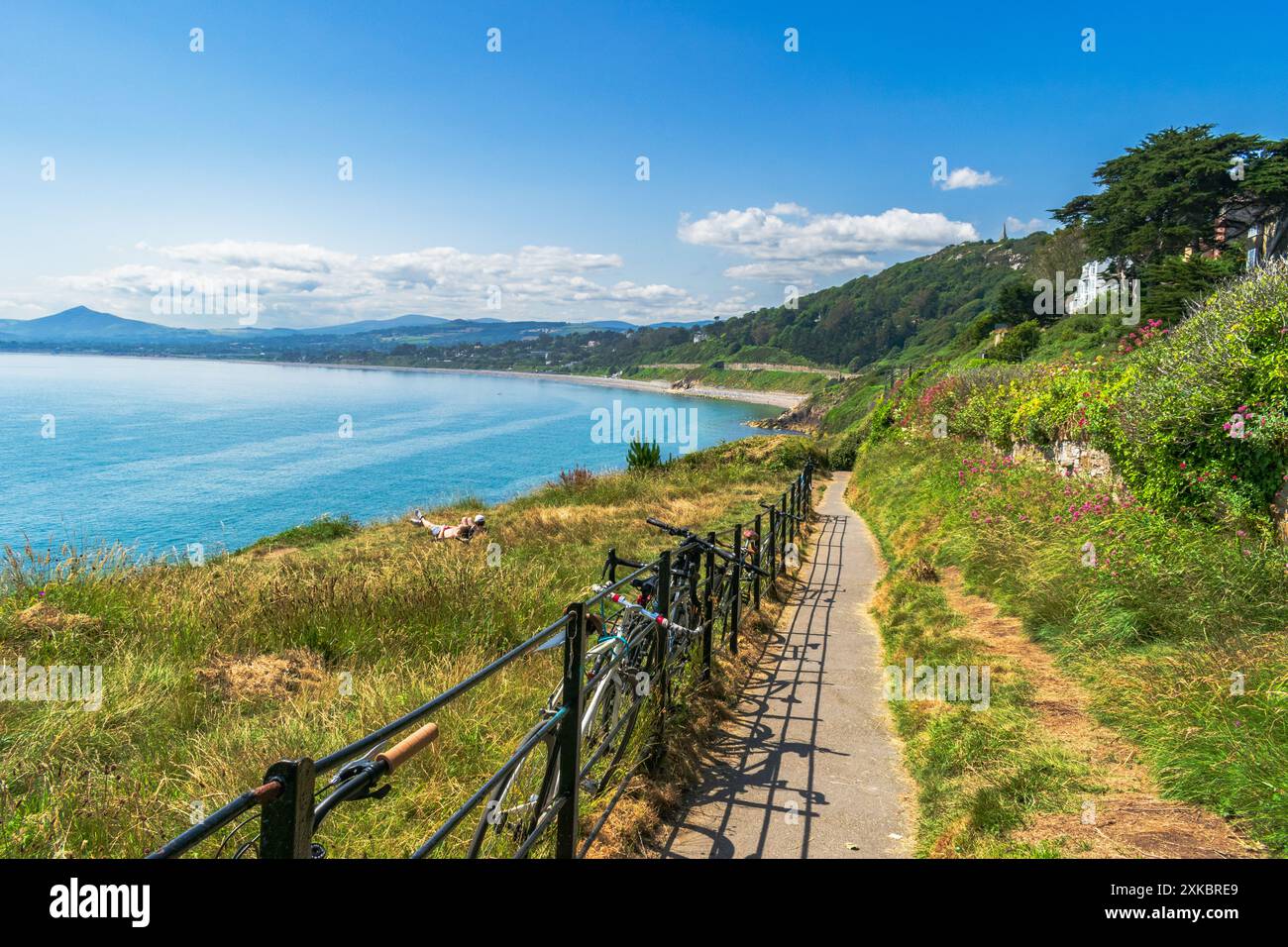 Summer stroll along Killiney Bay Stock Photo - Alamy