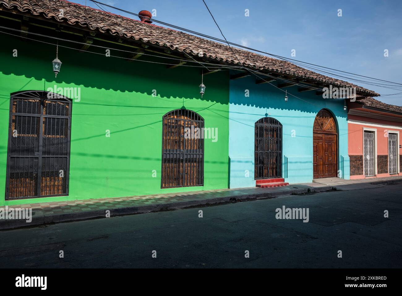 Colourful colonial style street in the city centre of Granada ...