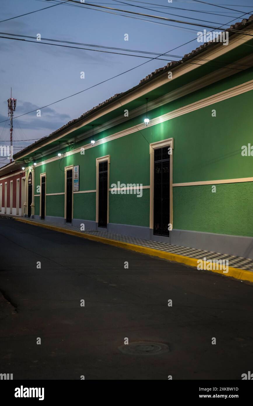 Colonial style street in the city centre at dusk, Granada, Nicaragua ...