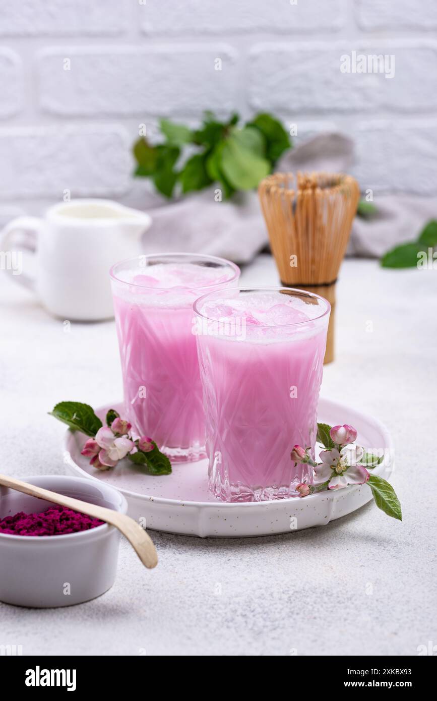 Pink matcha ice latte with milk Stock Photo - Alamy