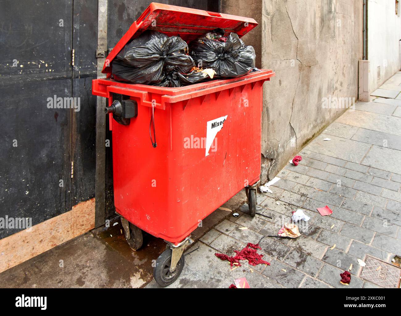 Inverness Scotland red waste bin overflowing with rubbish and food ...