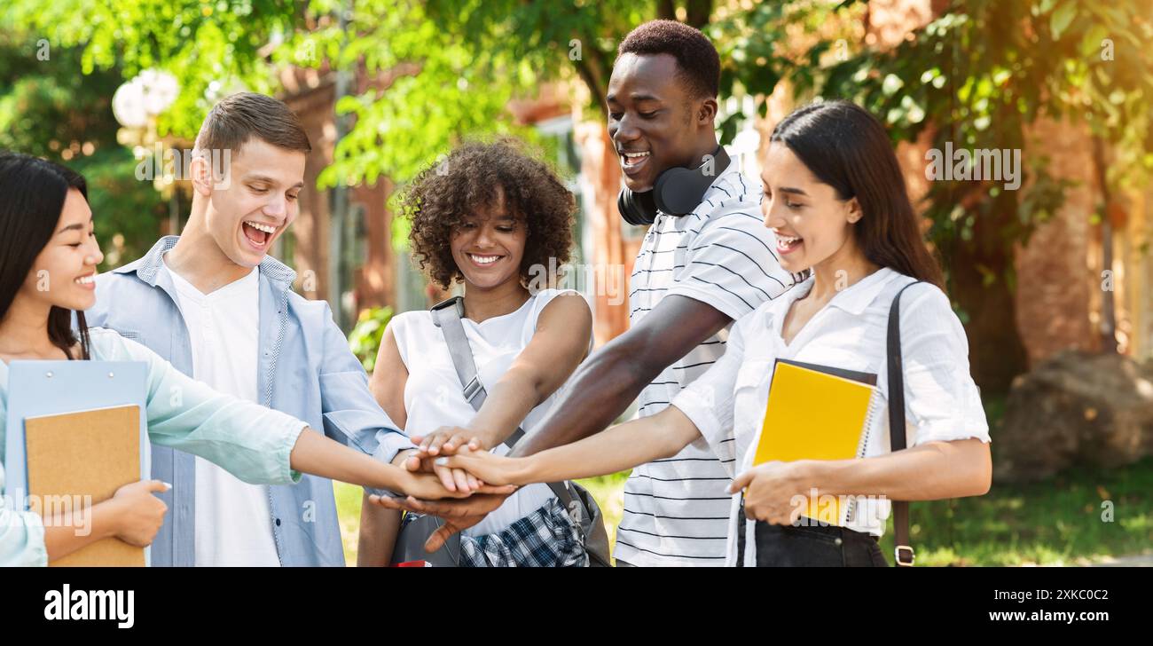 Exam Pass Celebration. Group Of College Students Stacking Hands ...