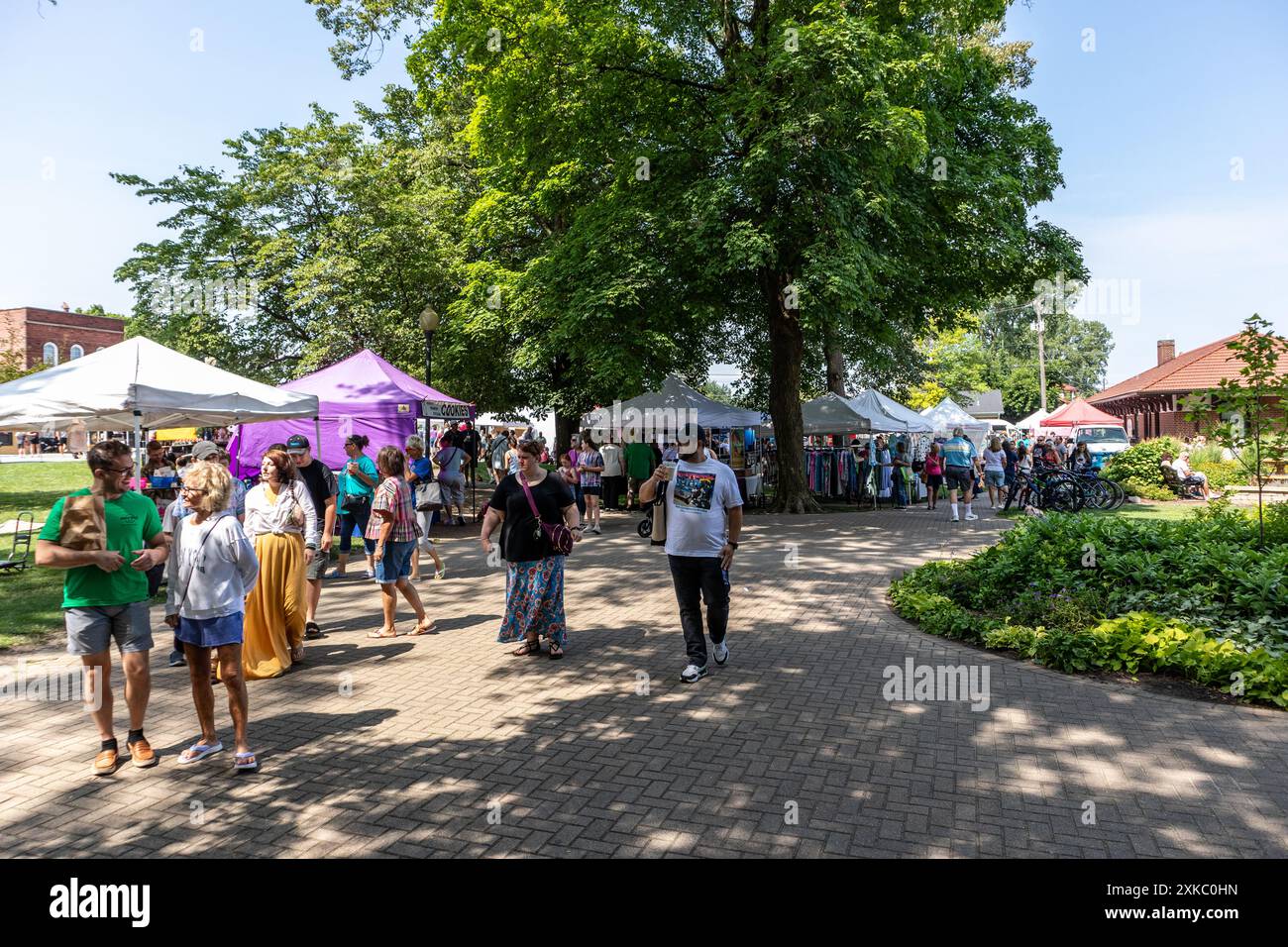 People walking around at the Chesterton European Market in downtown ...
