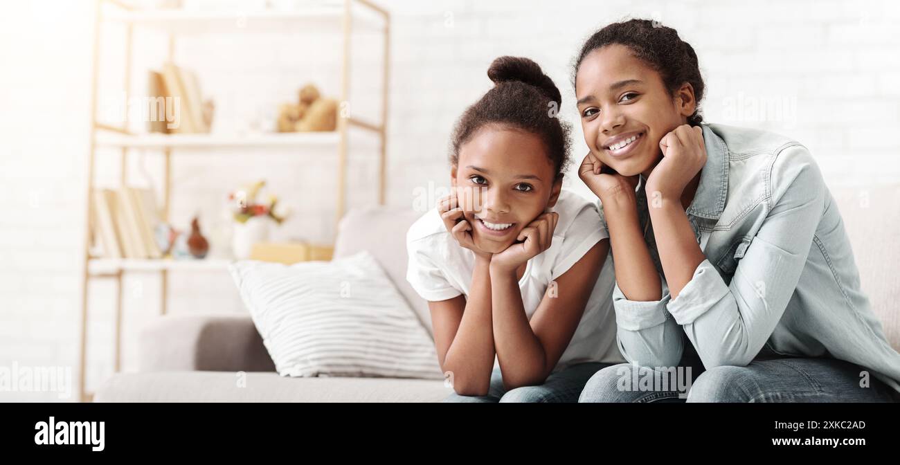 Older and younger sister black hi-res stock photography and images - Alamy