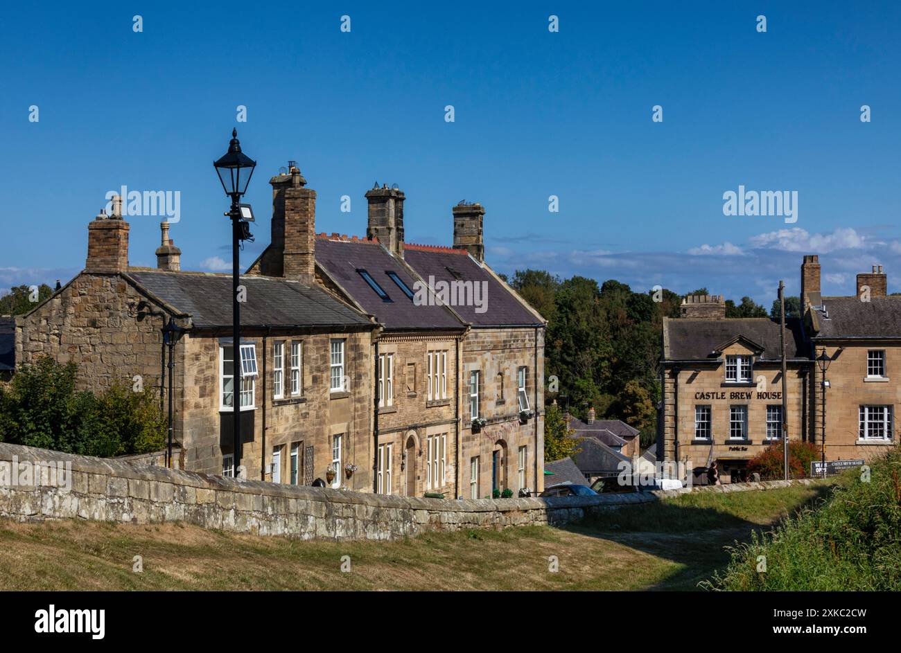 Warkworth, a village situated in a loop of the River Coquet, with a ...