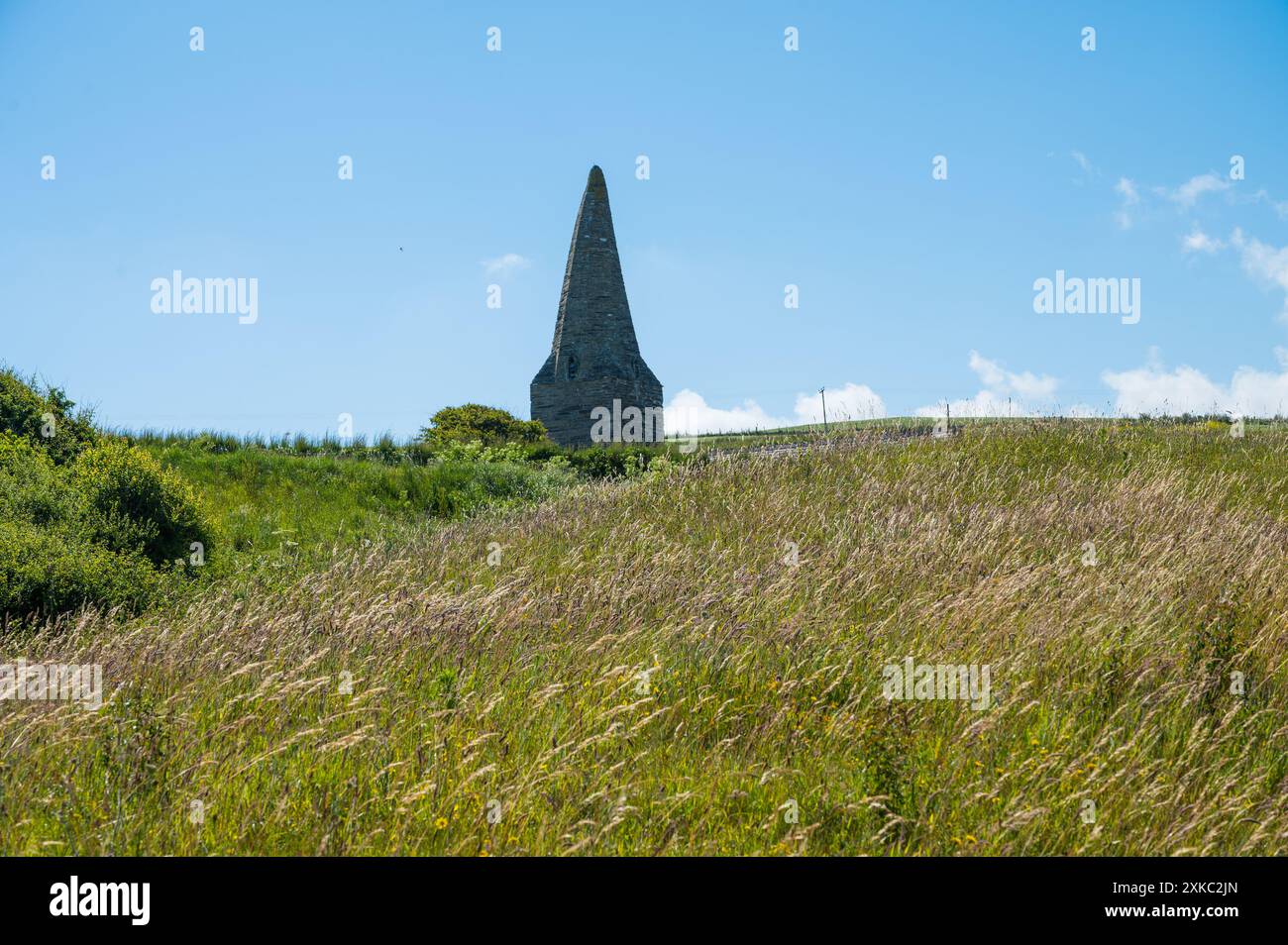 Spire of St Enodoc Church an Anglican chapel in the sand dunes above ...