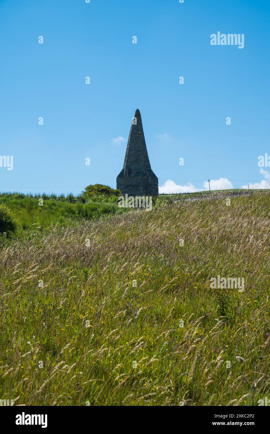 Spire of St Enodoc Church an Anglican chapel in the sand dunes above ...