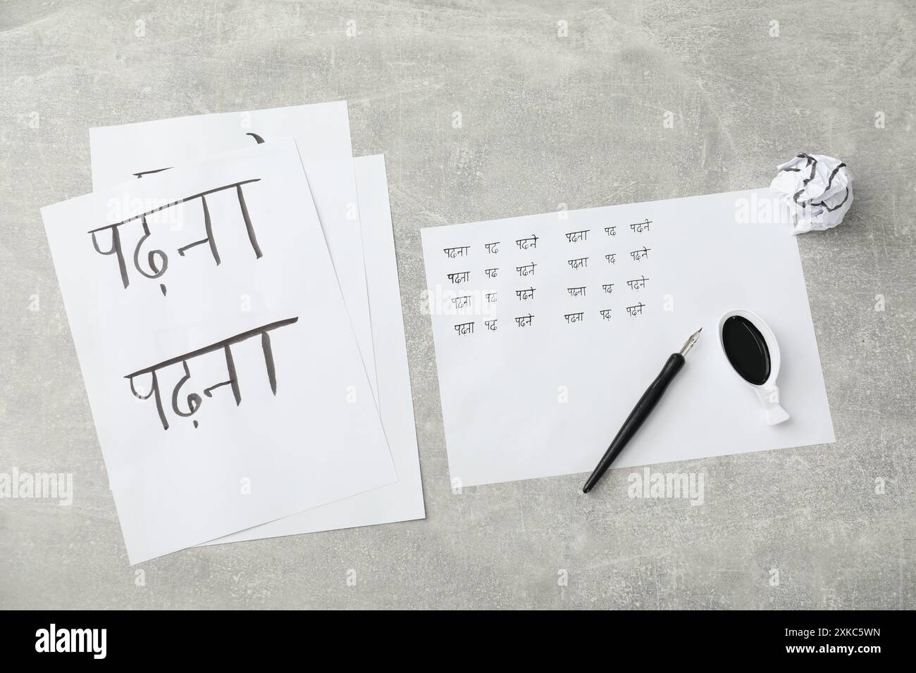 Calligraphy. Sheets of paper with written words Reading and Read in ...