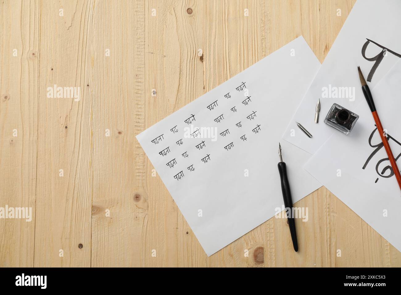 Calligraphy. Sheets of paper with written words Reading and Read in ...