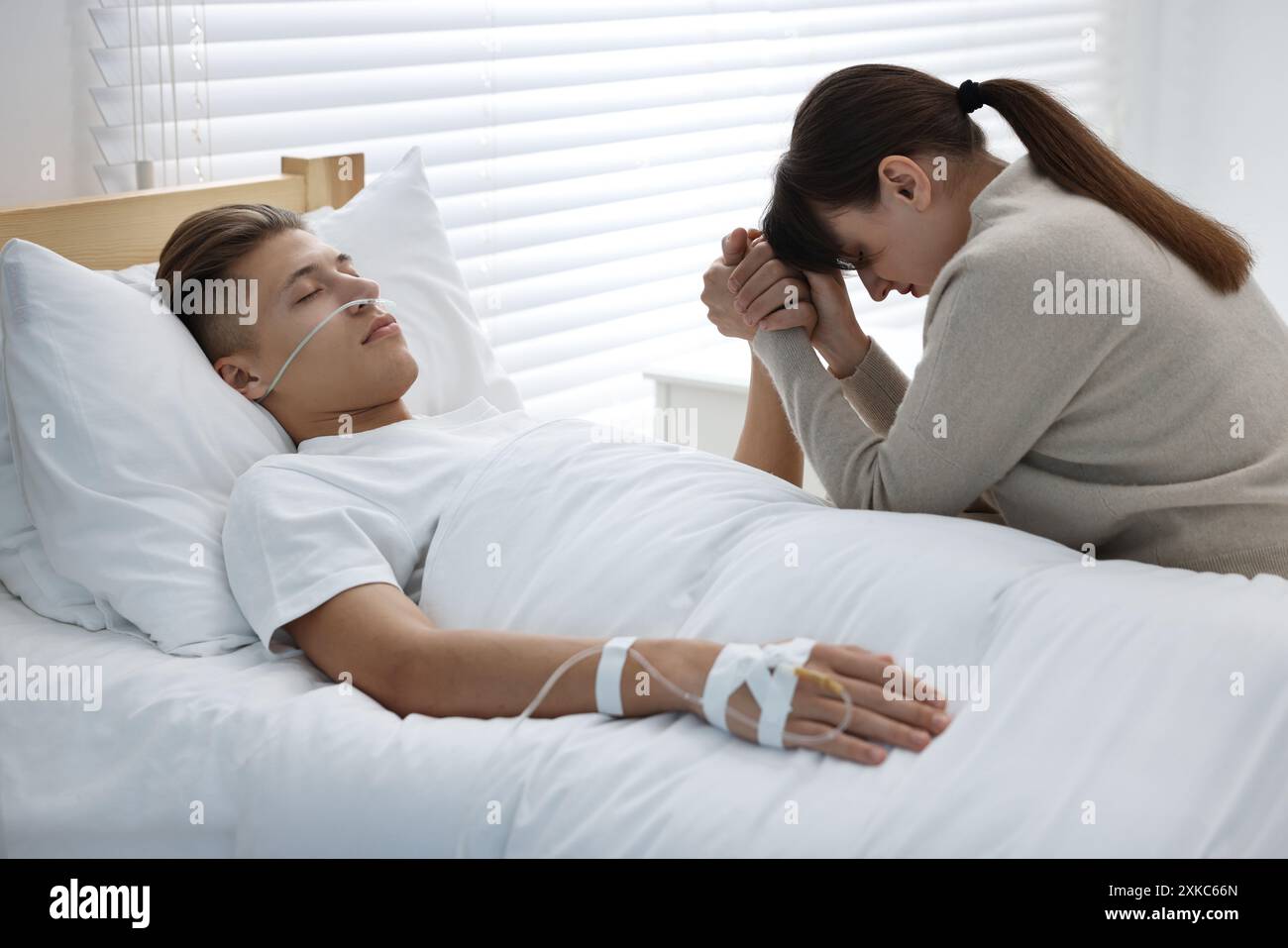 Woman dying in bed husband hi-res stock photography and images - Alamy