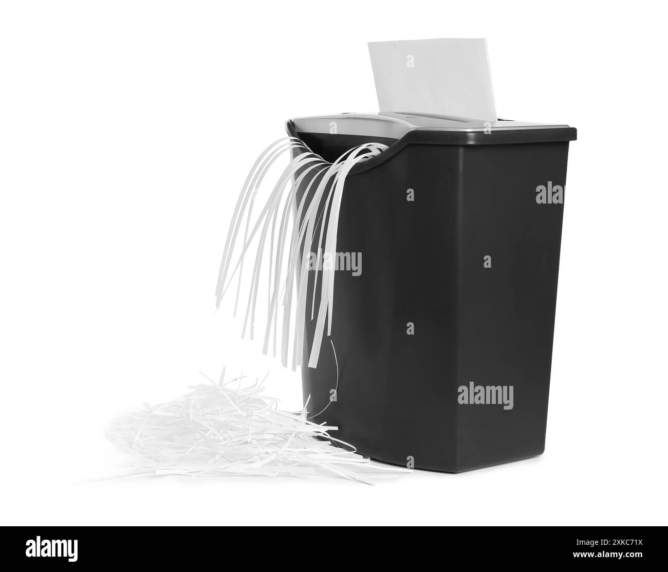 Destroying sheet of paper with shredder on white background Stock Photo ...