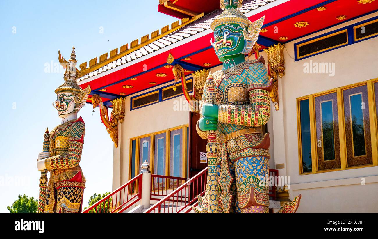 Statues of Yakshas, nature spirits serving as guardians at the gates of ...