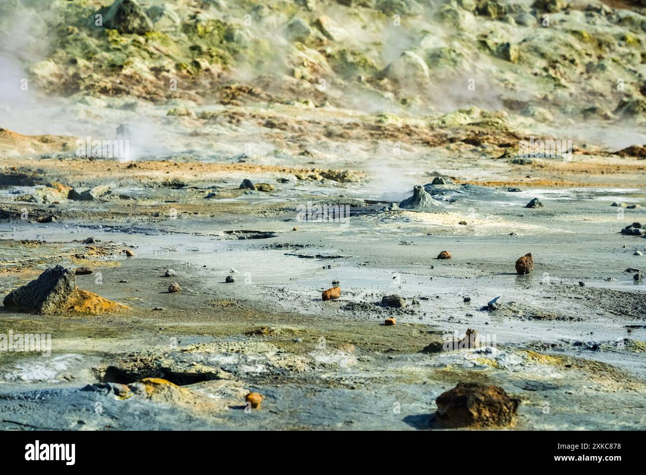 Lifeless rocky sulfur terrain hot springs with boiling water and steam ...