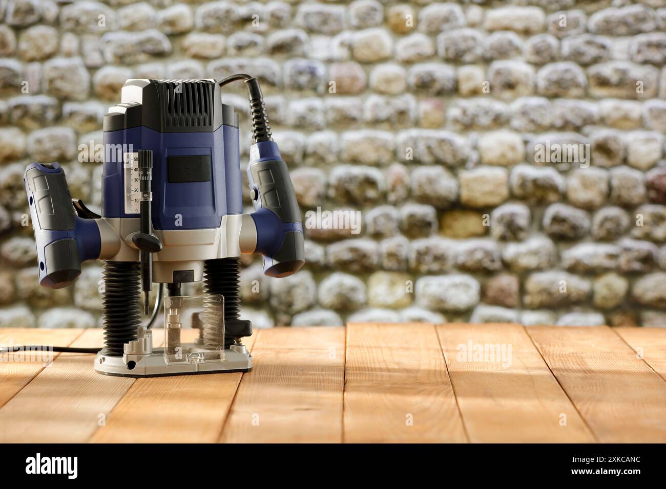 Milling cutting tool machine on a wooden workbench in a craftsman's ...