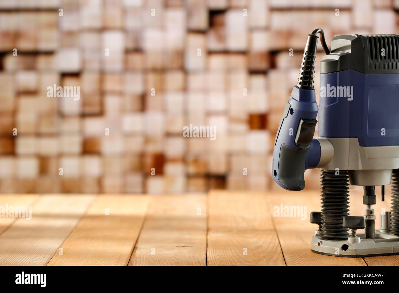 Milling cutting tool machine on a wooden workbench in a craftsman's ...