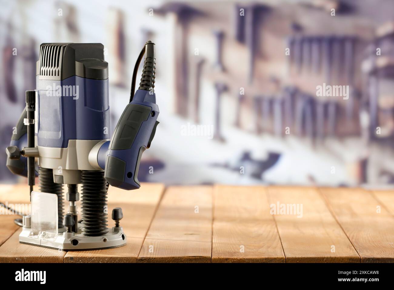Milling cutting tool machine on a wooden workbench in a craftsman's ...