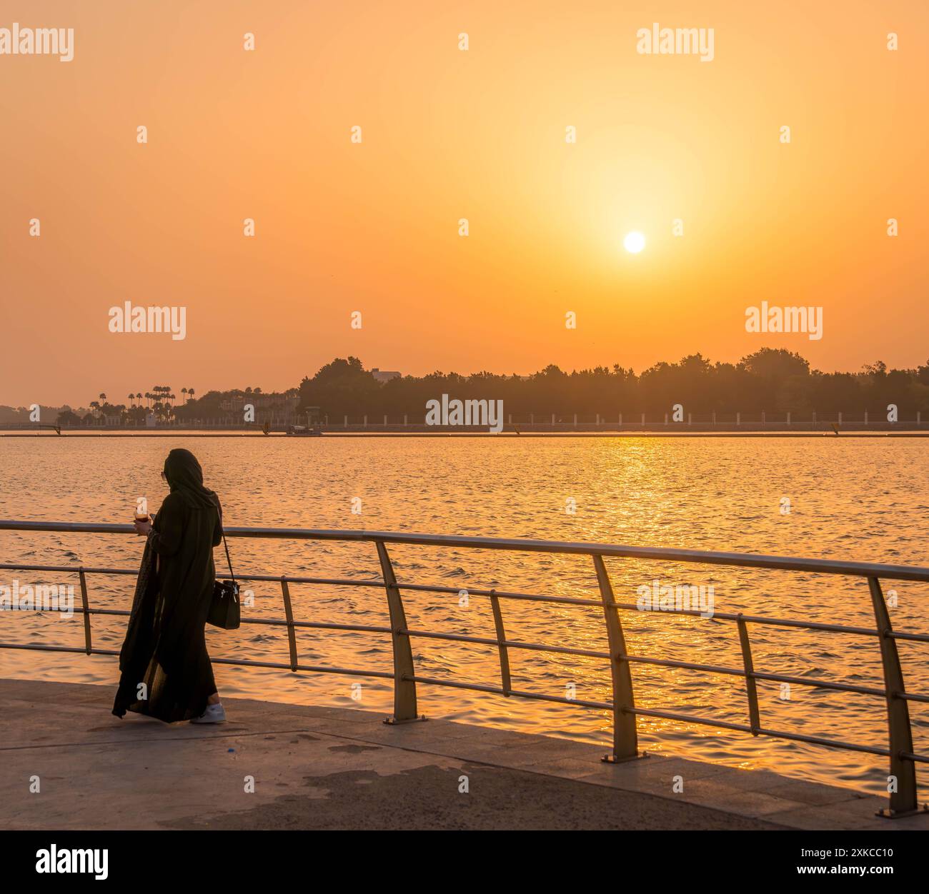 The paranja covered Muslim woman on Jeddah corniche (waterfront) in ...