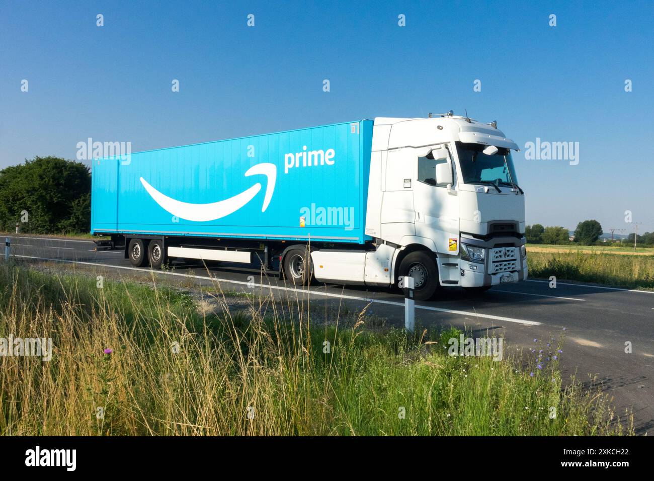 Amazon Prime delivery truck on road scene Stock Photo - Alamy