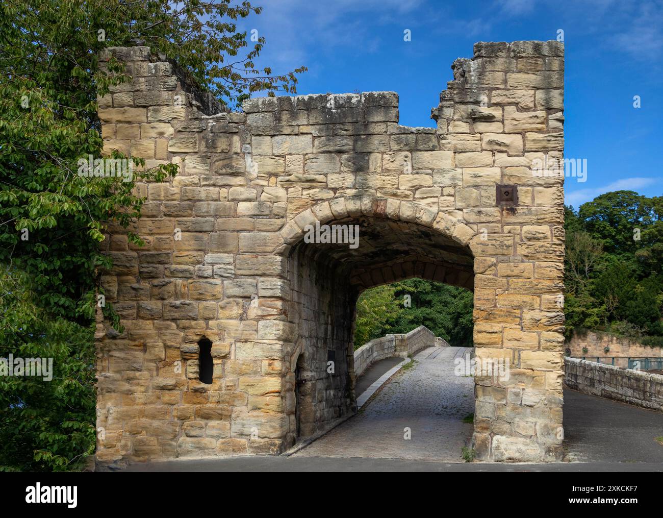 Ancient bridge in Warkworth, in Northumberland, England Stock Photo - Alamy