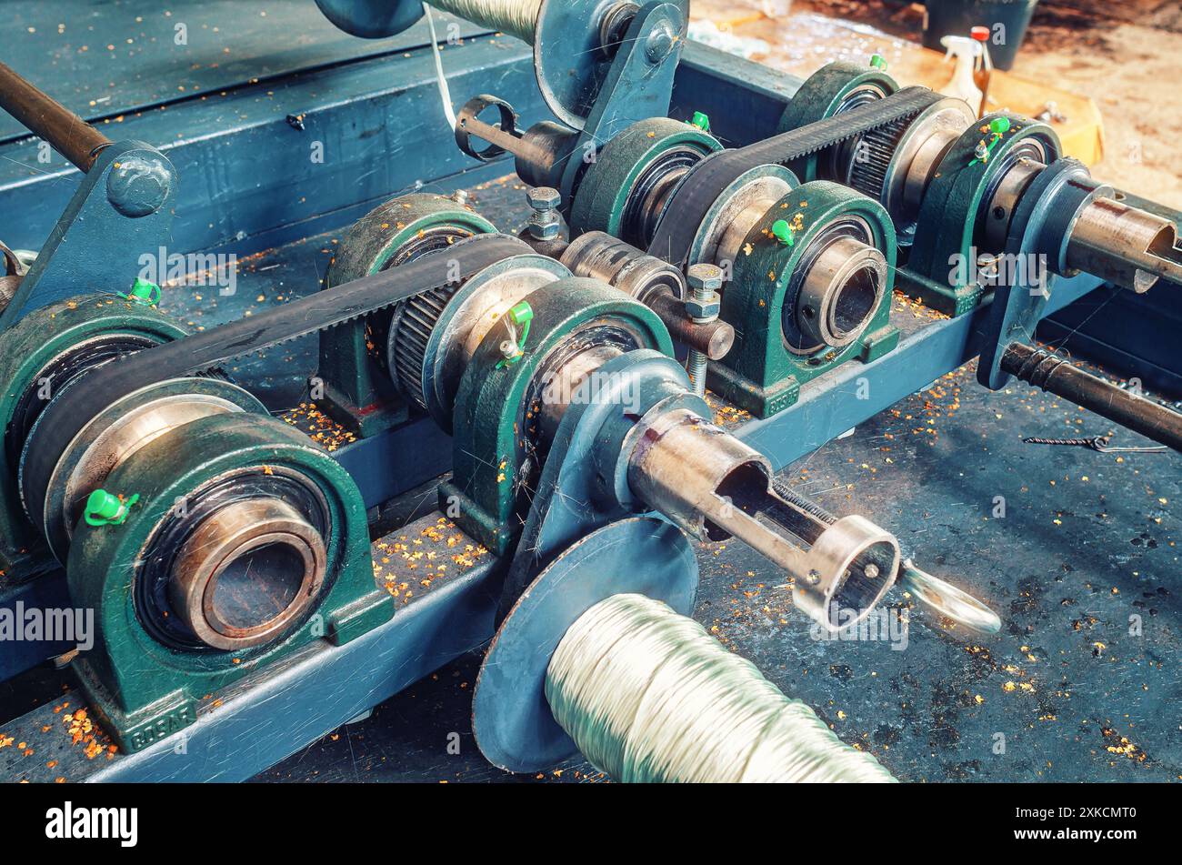 Large industrial machine with metal shafts and plates. Coils for ...