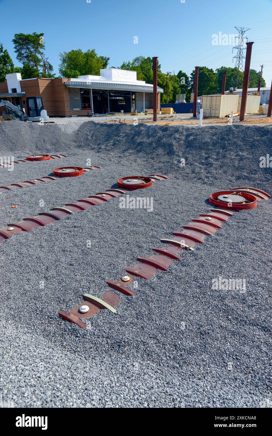Vertical close-up shot of four underground fuel storage tanks at new ...