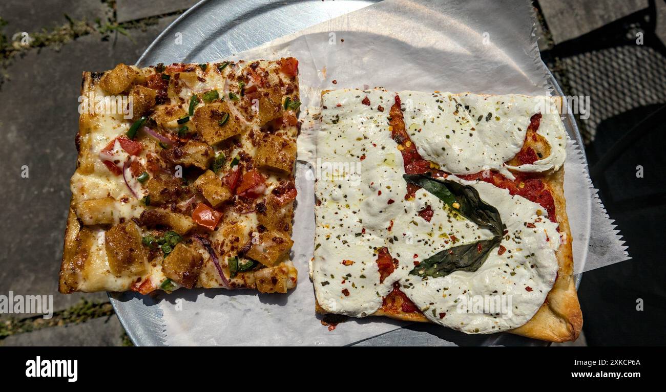 two square slices of sicilian style pizza (fresh white mozzarella basil ...