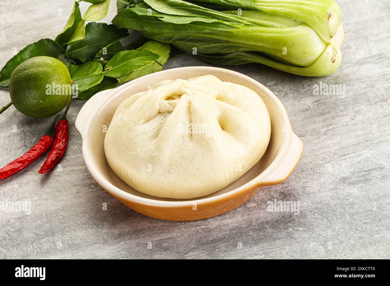Chinese steamed bun Dim sum with meat Stock Photo - Alamy