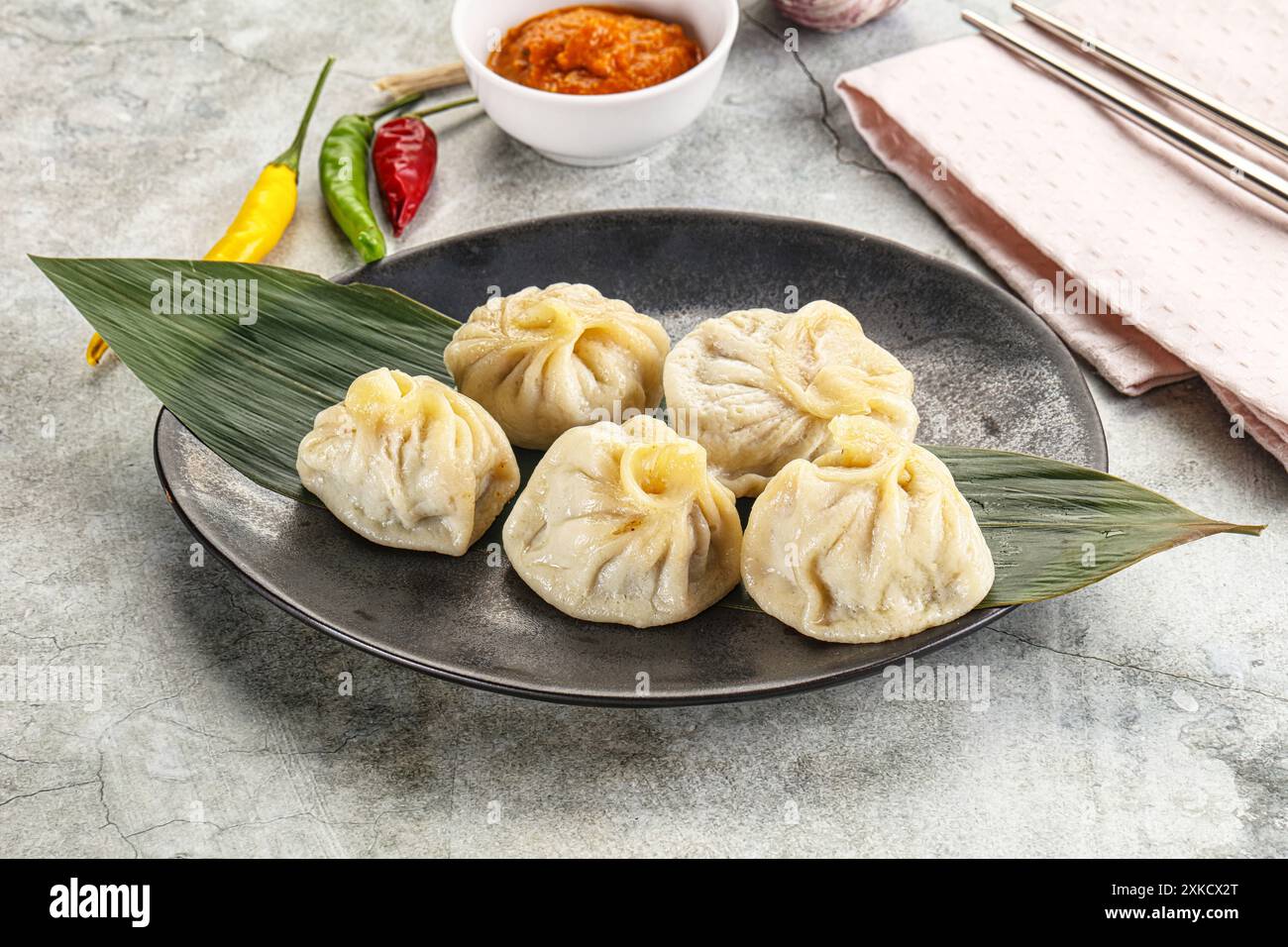 Chinese traditional steamed dumpligs momo with meat Stock Photo - Alamy