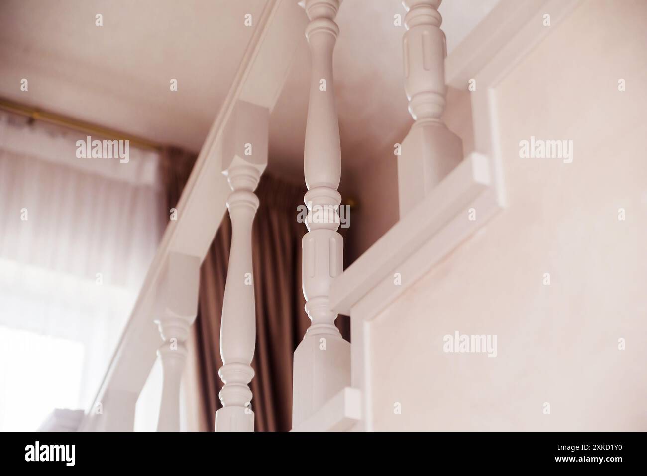 Close-up view of white staircase spindles, highlighting their classic ...