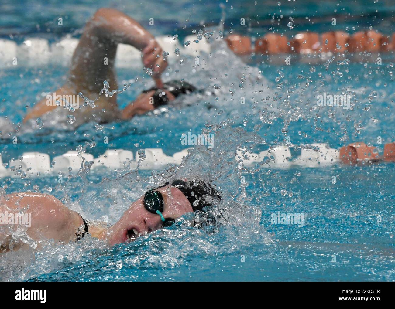 Carli Cronk of Churchill, front, races Montserrat Spielmann of Reagan ...