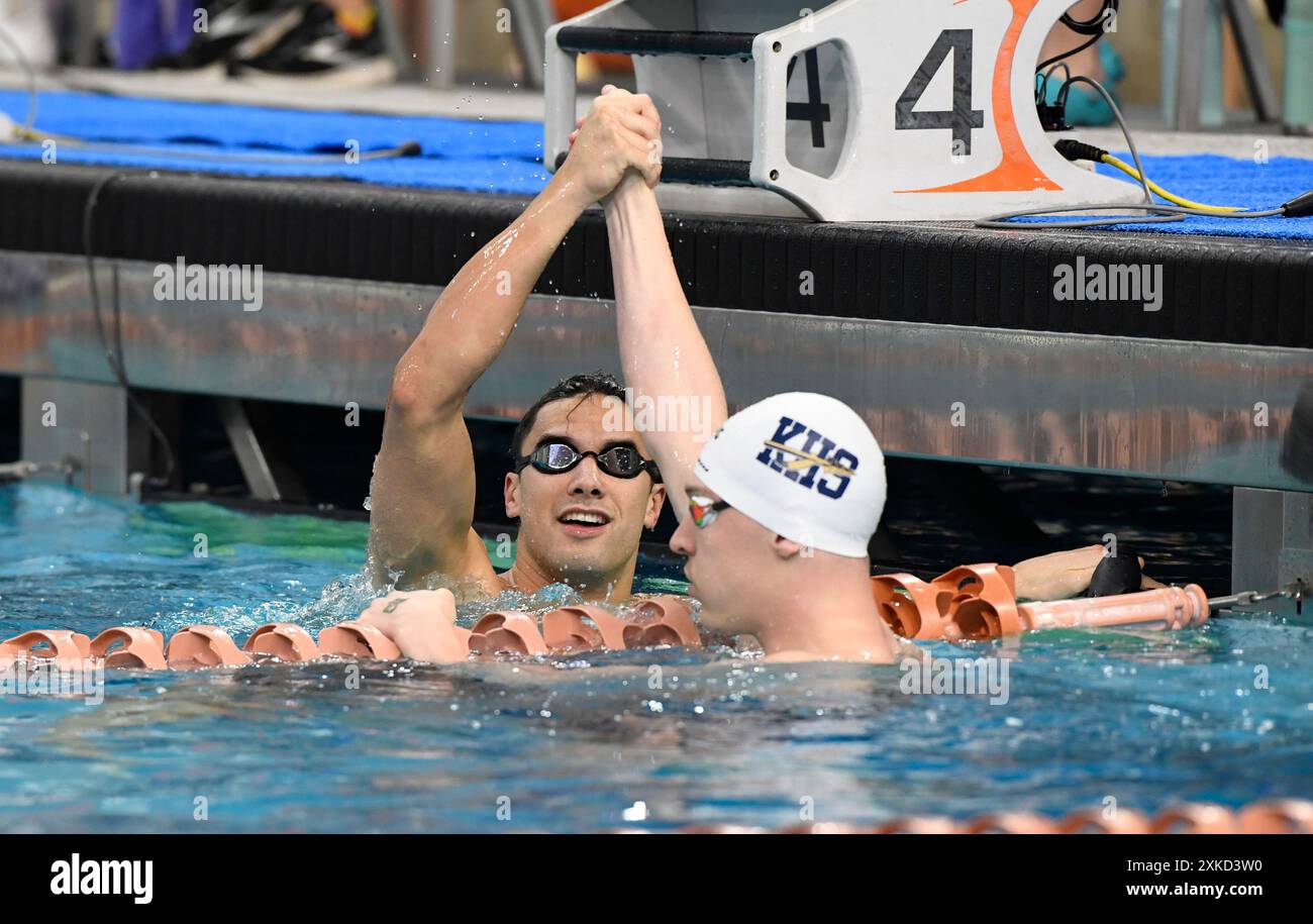 Evan Croley of Clark raises the hand of River Paulk of Keller after ...