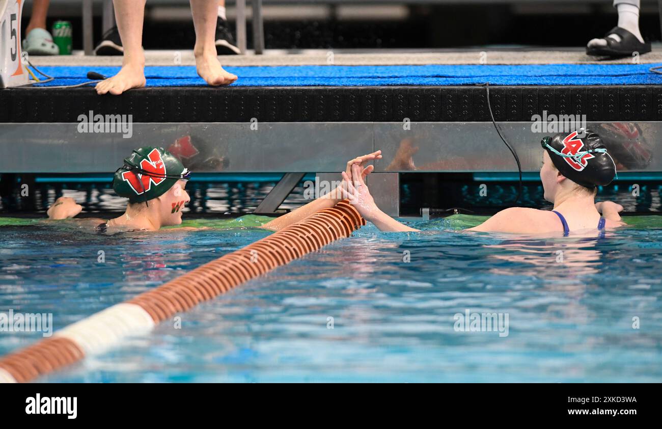 Maria Uranga of The Woodlands, left, congratulates Carli Cronk of ...