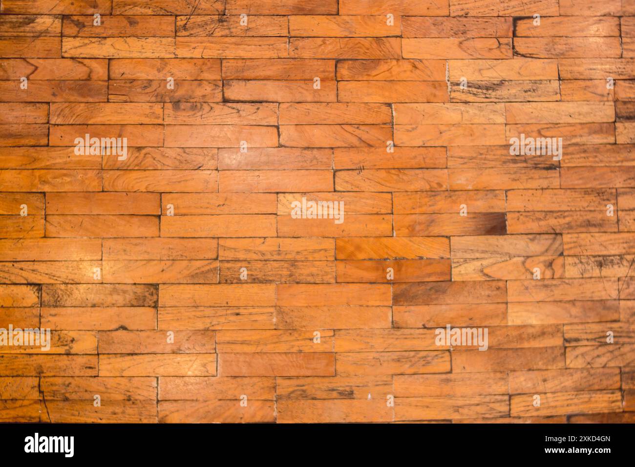 Brick wall background is a wall made of clay bricks, giving the ...