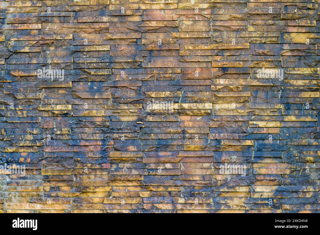 Brick wall background is a wall made of clay bricks, giving the ...