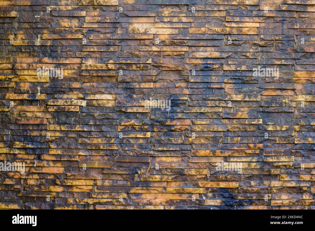 Brick wall background is a wall made of clay bricks, giving the ...