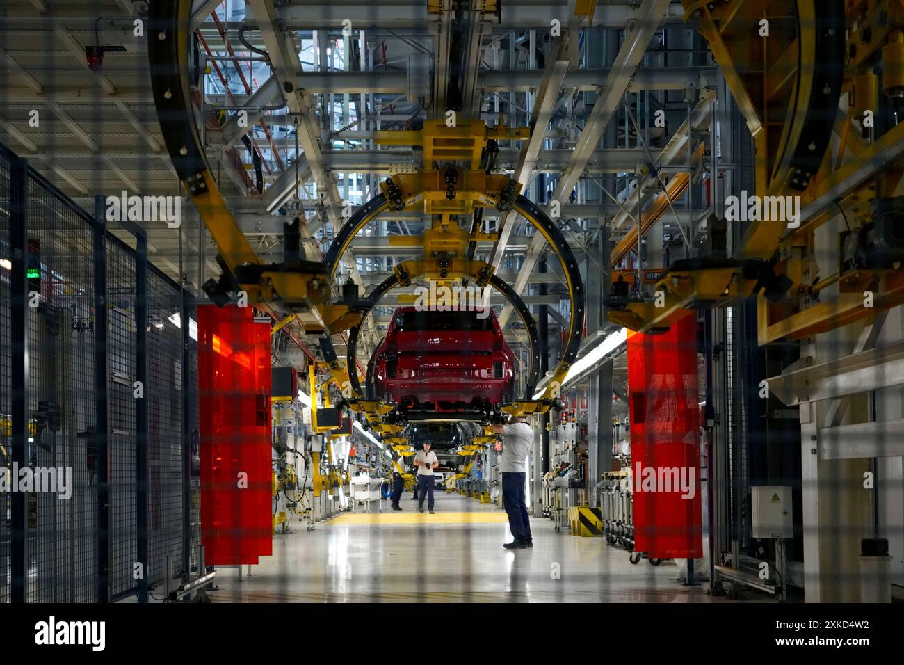 Workers check all-new Fiat Grande Panda cars in the assembly hall in ...