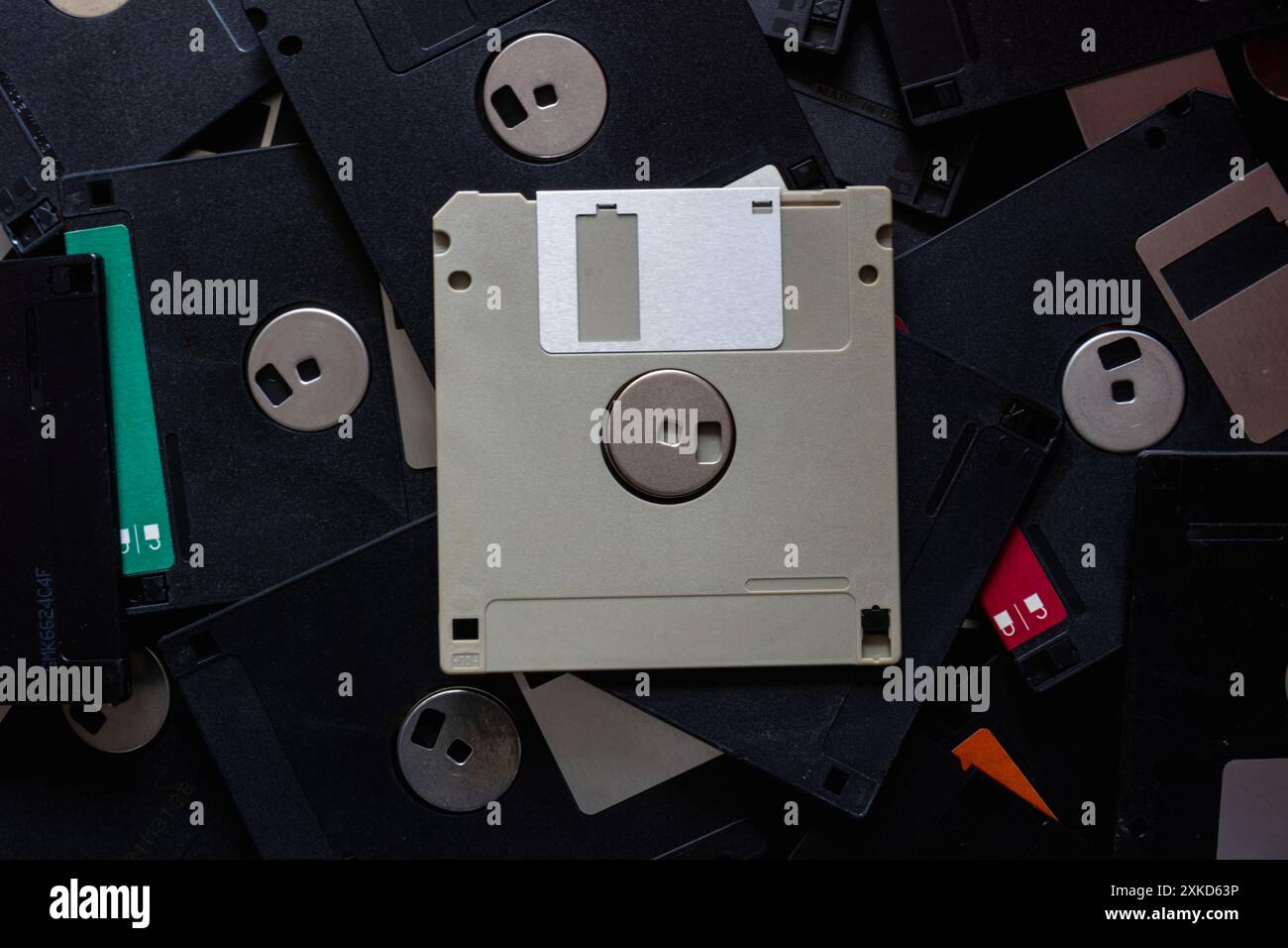 A square floppy disk is a magnetic disk for storing data in an old ...