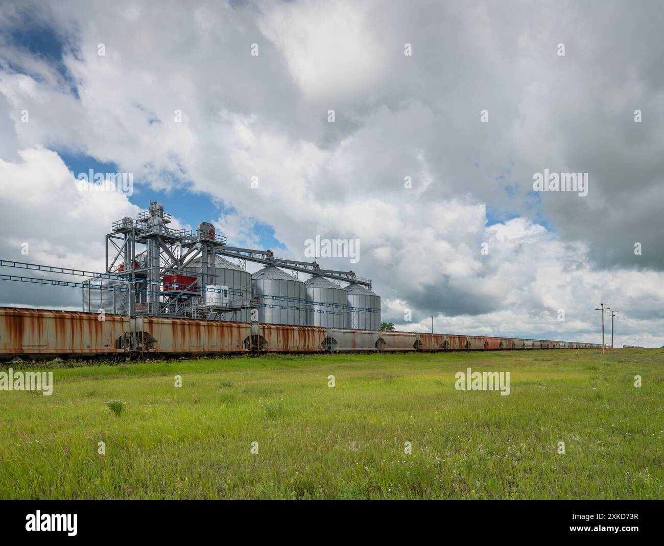 Large grain bins and parked train at the village of Lajord, Saskatchewan, Canada Stock Photo - Alamy