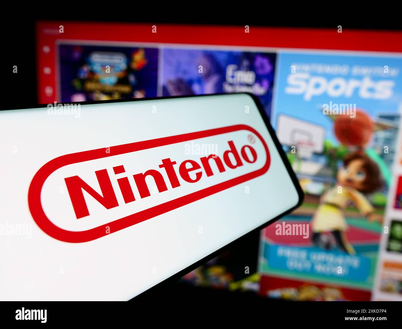 Mobile phone with logo of Japanese video game company Nintendo Co. Ltd ...