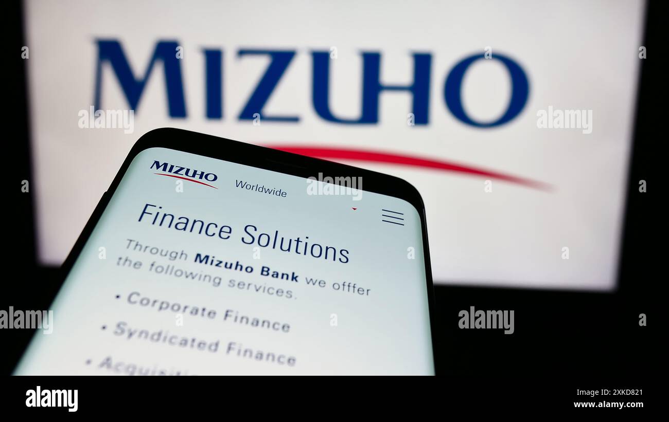 Mobile phone with website of Japanese banking company Mizuho Financial ...