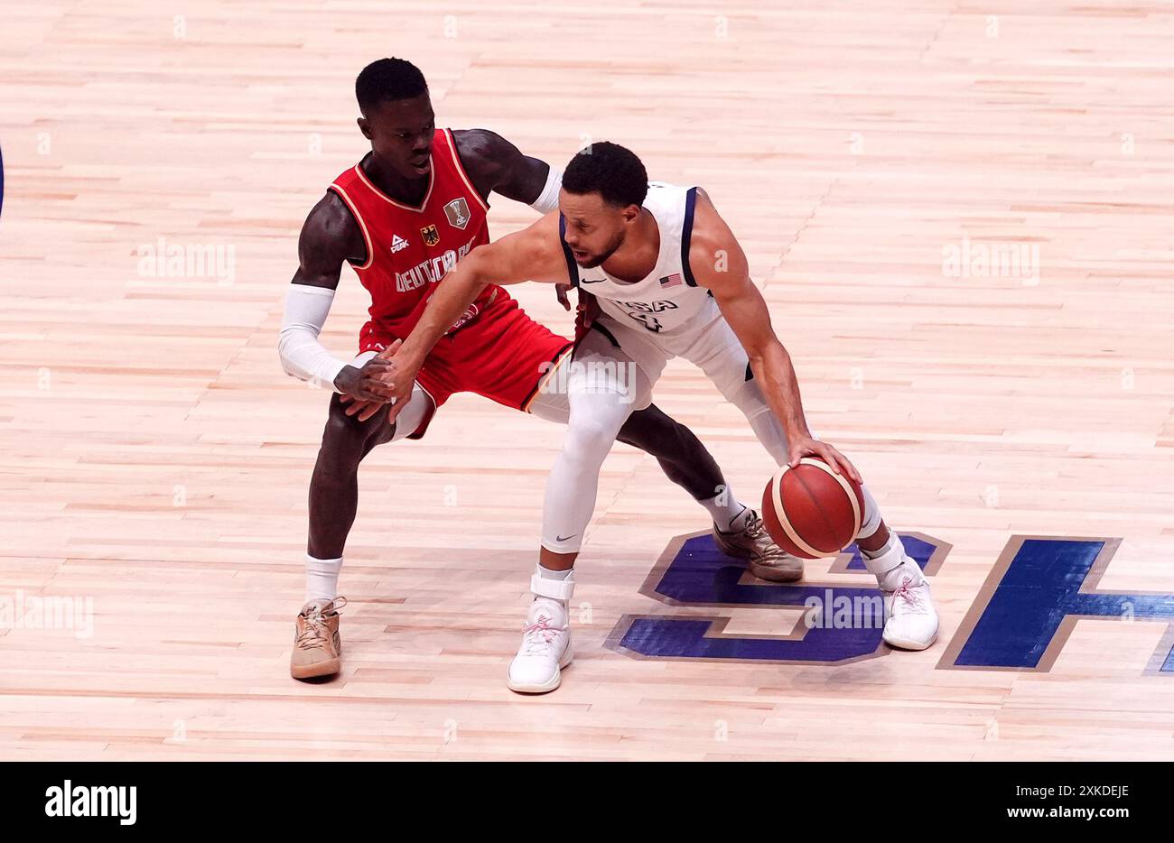 USA's Stephen Curry and Germany's Dennis Schroder during the 2024 USA ...