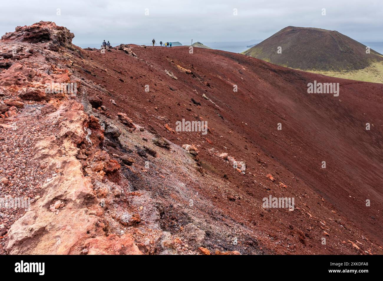The city of Heimaey and the haven are located at the foot of the ...